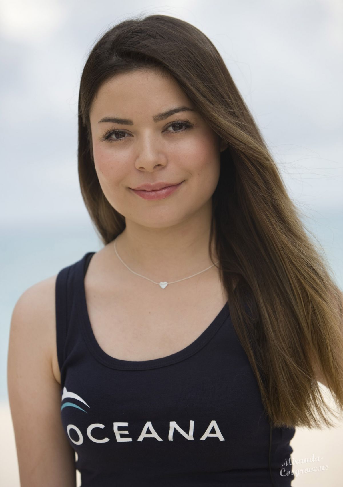 MIRANDA COSGROVE at Oceanup Swimming with Dolphins Campaign – HawtCelebs