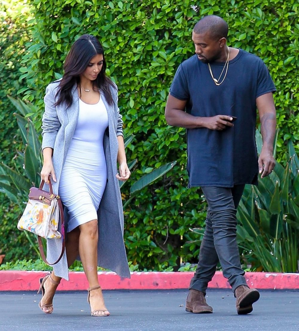 KIM KARDASHIAN and Kanye West Arrives at Jenner Communications in ...
