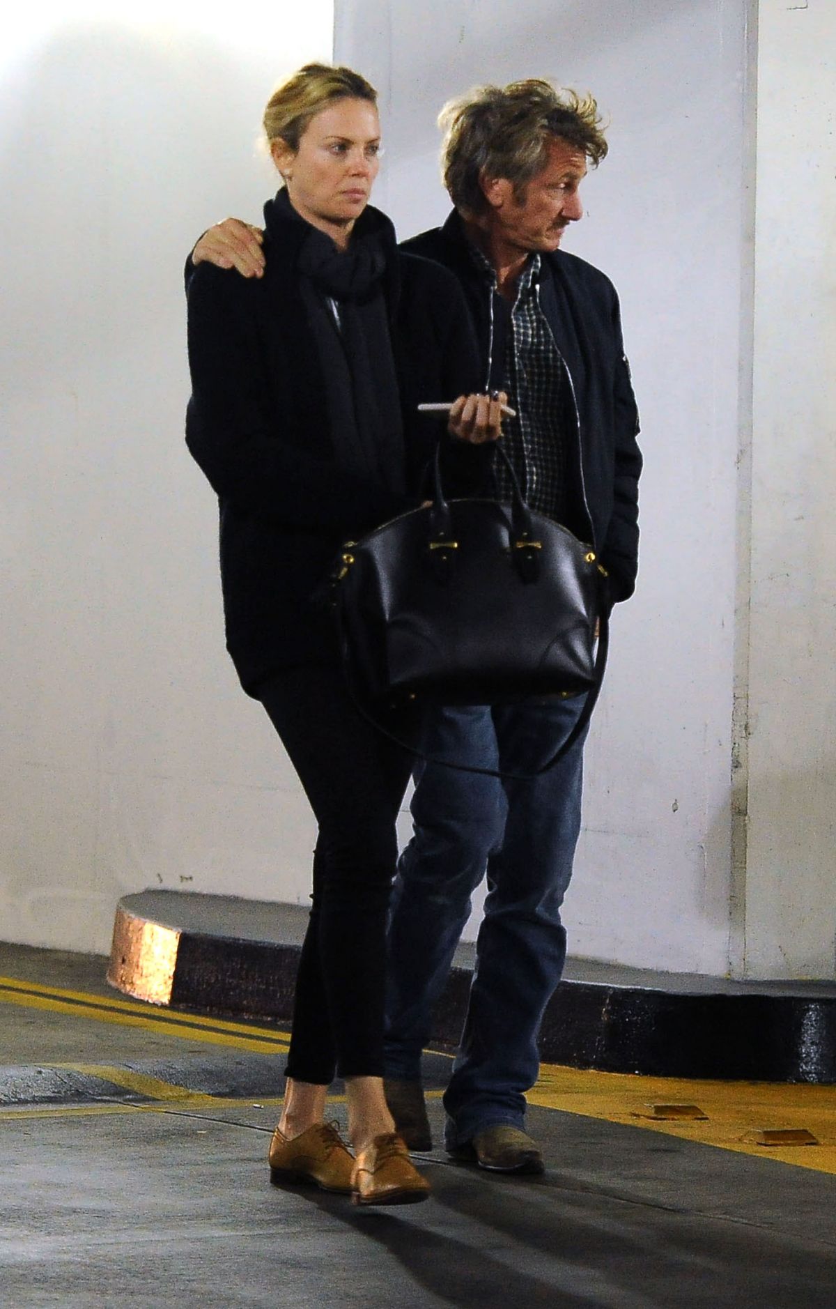 CHARLIZE THERON and Sean Penn at a Cigarette Break – HawtCelebs