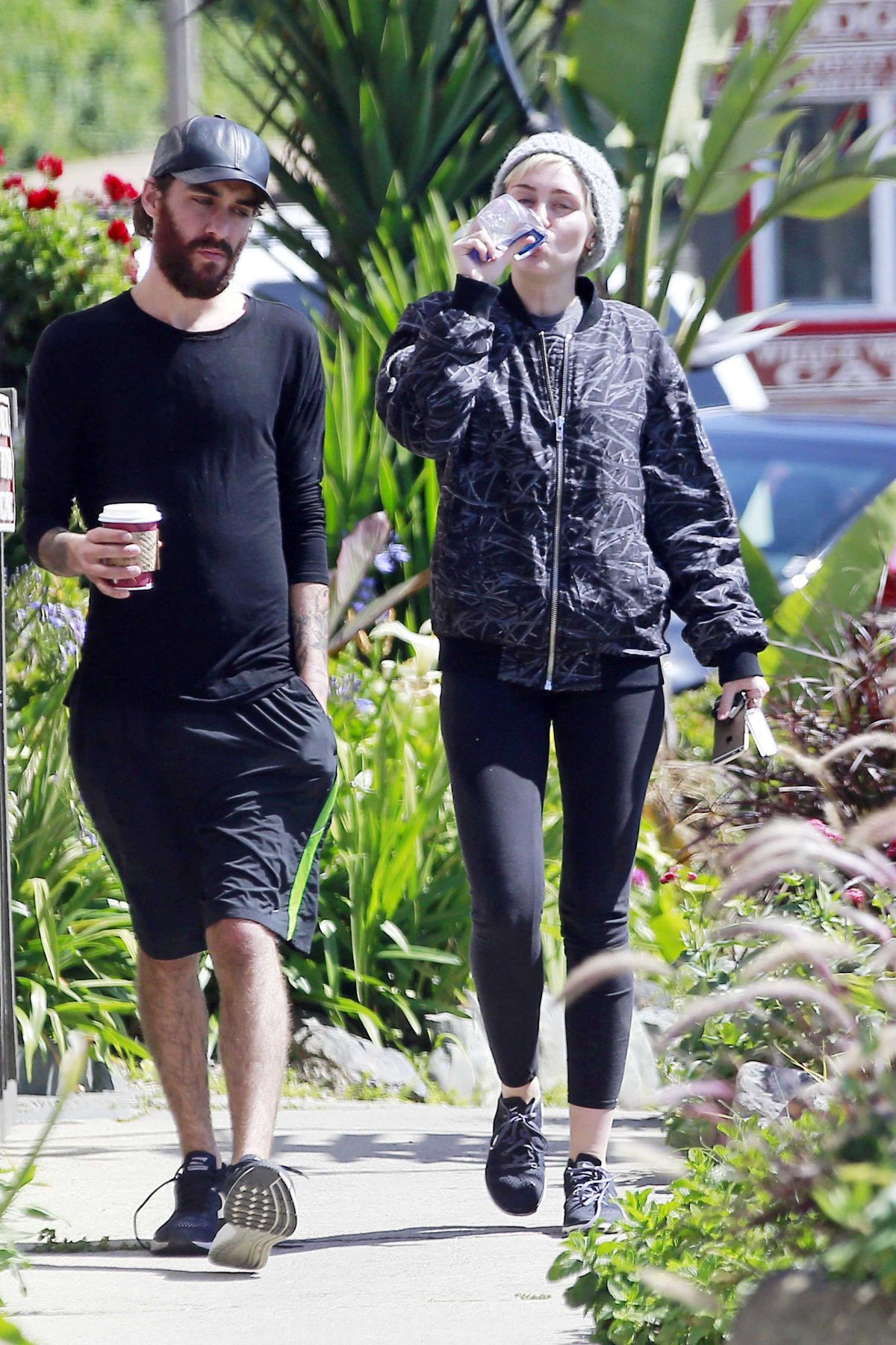 MILEY CYRUS and Patrick Schwarzenegger Out for a Walk in Northern ...