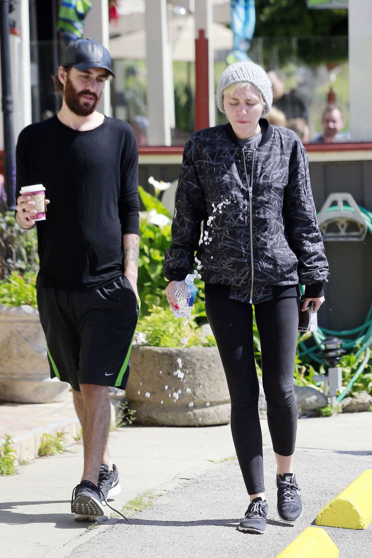 MILEY CYRUS and Patrick Schwarzenegger Out for a Walk in Northern ...