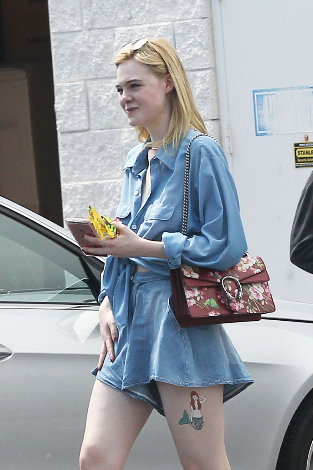 ELLE FANNING in Denim Short Out in Los Angeles 06/28/2016 – HawtCelebs