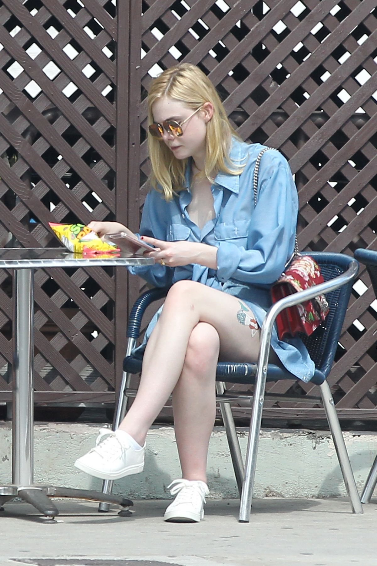 ELLE FANNING in Denim Short Out in Los Angeles 06/28/2016 – HawtCelebs