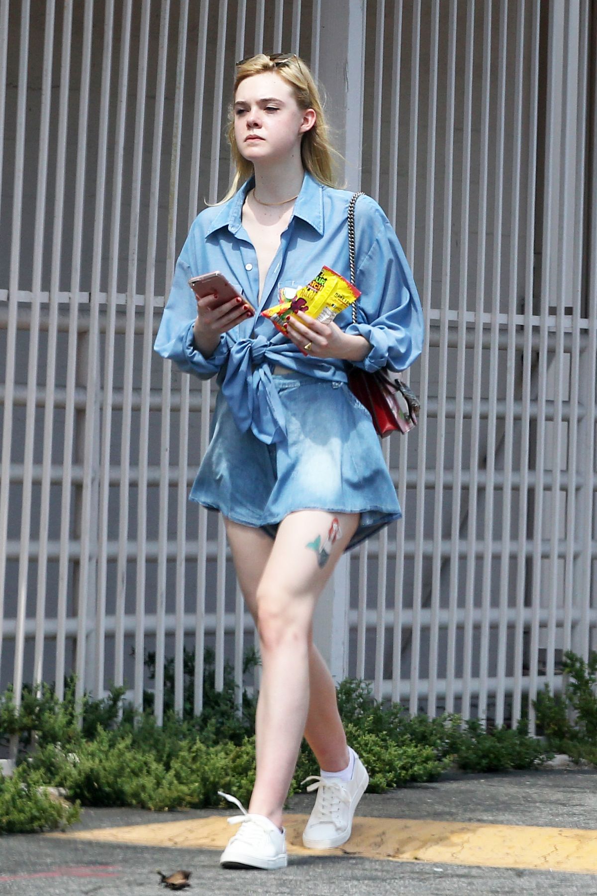 ELLE FANNING in Denim Short Out in Los Angeles 06/28/2016 – HawtCelebs