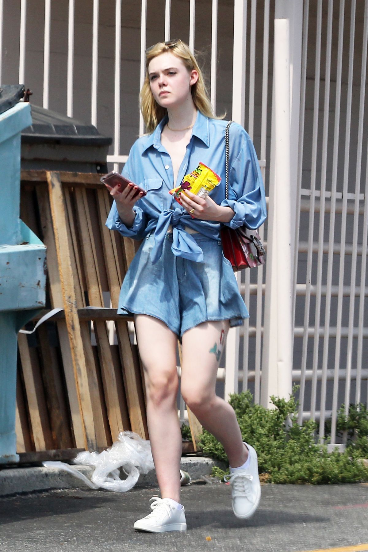 ELLE FANNING in Denim Short Out in Los Angeles 06/28/2016 – HawtCelebs