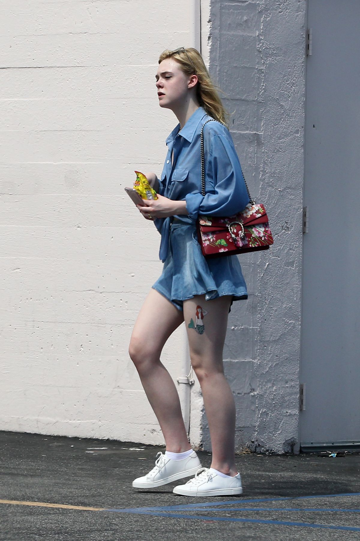 ELLE FANNING in Denim Short Out in Los Angeles 06/28/2016 – HawtCelebs
