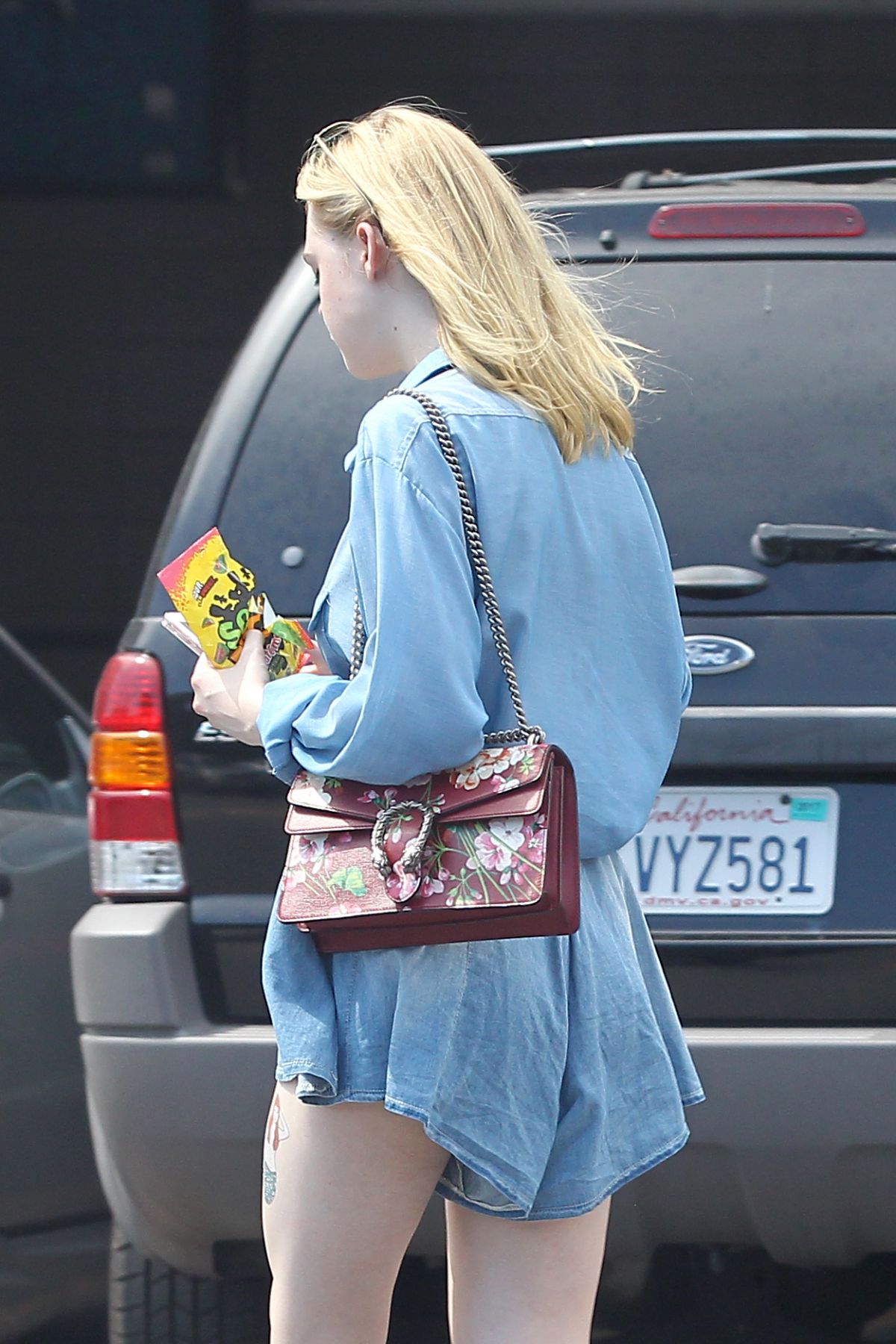 ELLE FANNING in Denim Short Out in Los Angeles 06/28/2016 – HawtCelebs