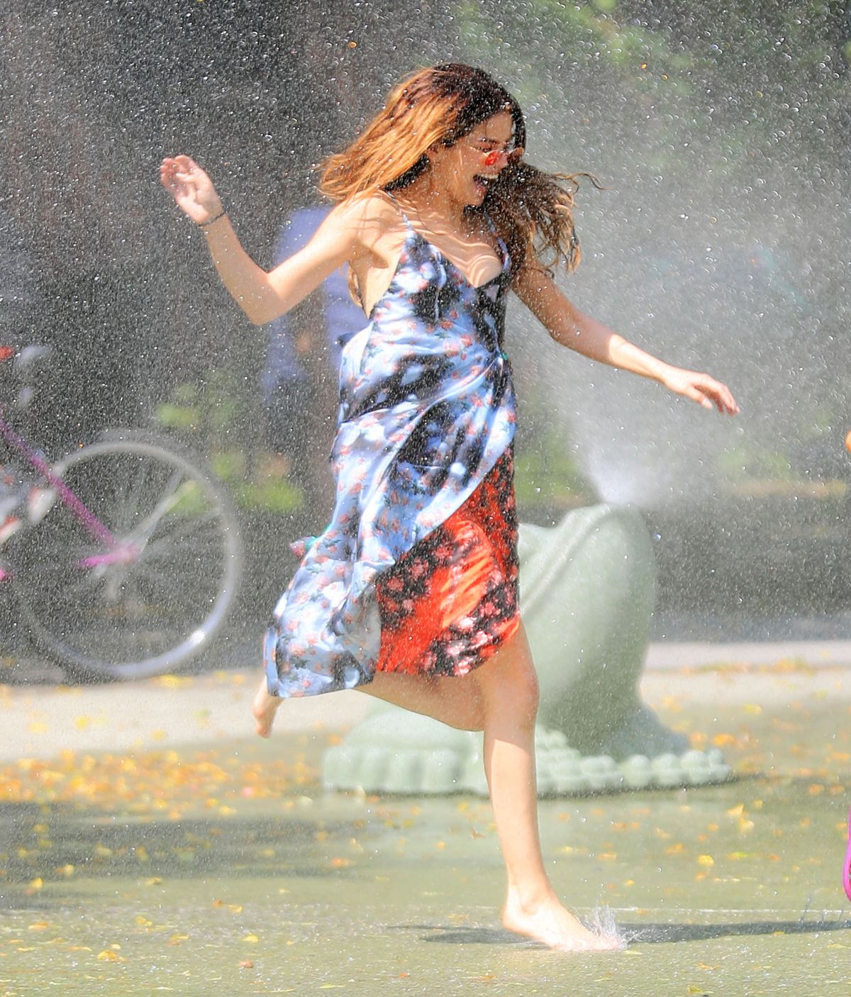 SELENA GOMEZ Running Thru Sprinklers at Water Playground in Brooklyn 06 ...