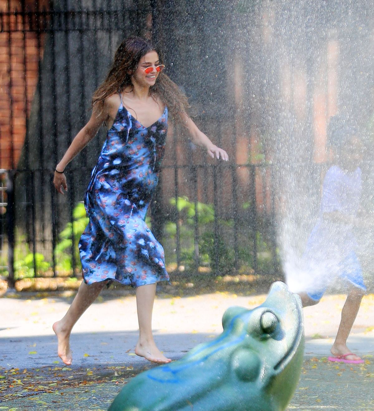 SELENA GOMEZ Running Thru Sprinklers at Water Playground in Brooklyn 06 ...