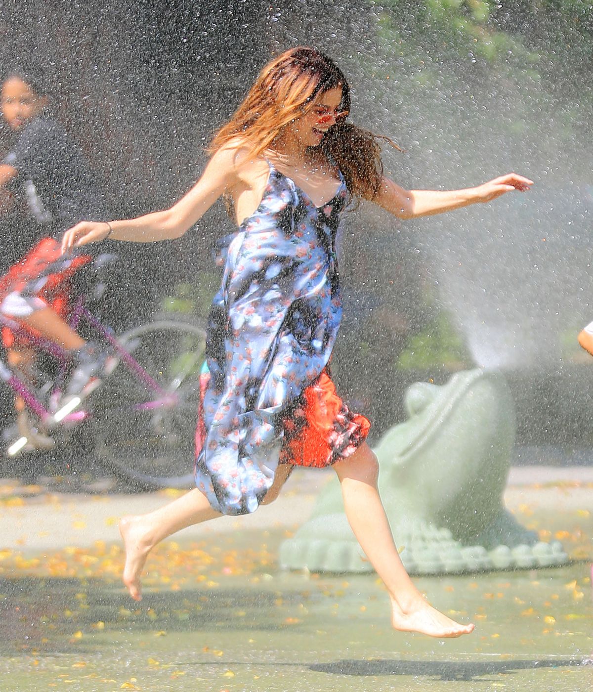 SELENA GOMEZ Running Thru Sprinklers at Water Playground in Brooklyn 06 ...