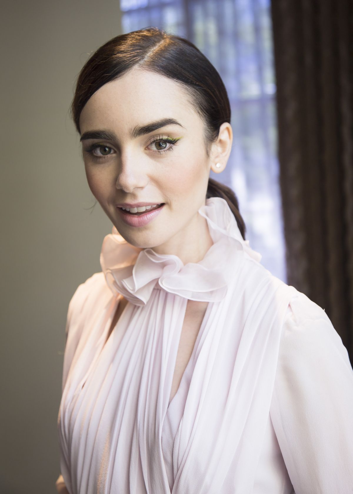 LILY COLLINS At Rules Don t Apply Press COnference In Beverly Hills