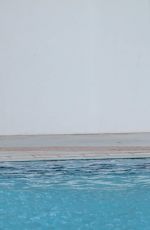 CLAUDIA ROMANI in Bikini at a Pool in Miami 11/13/2016 – HawtCelebs