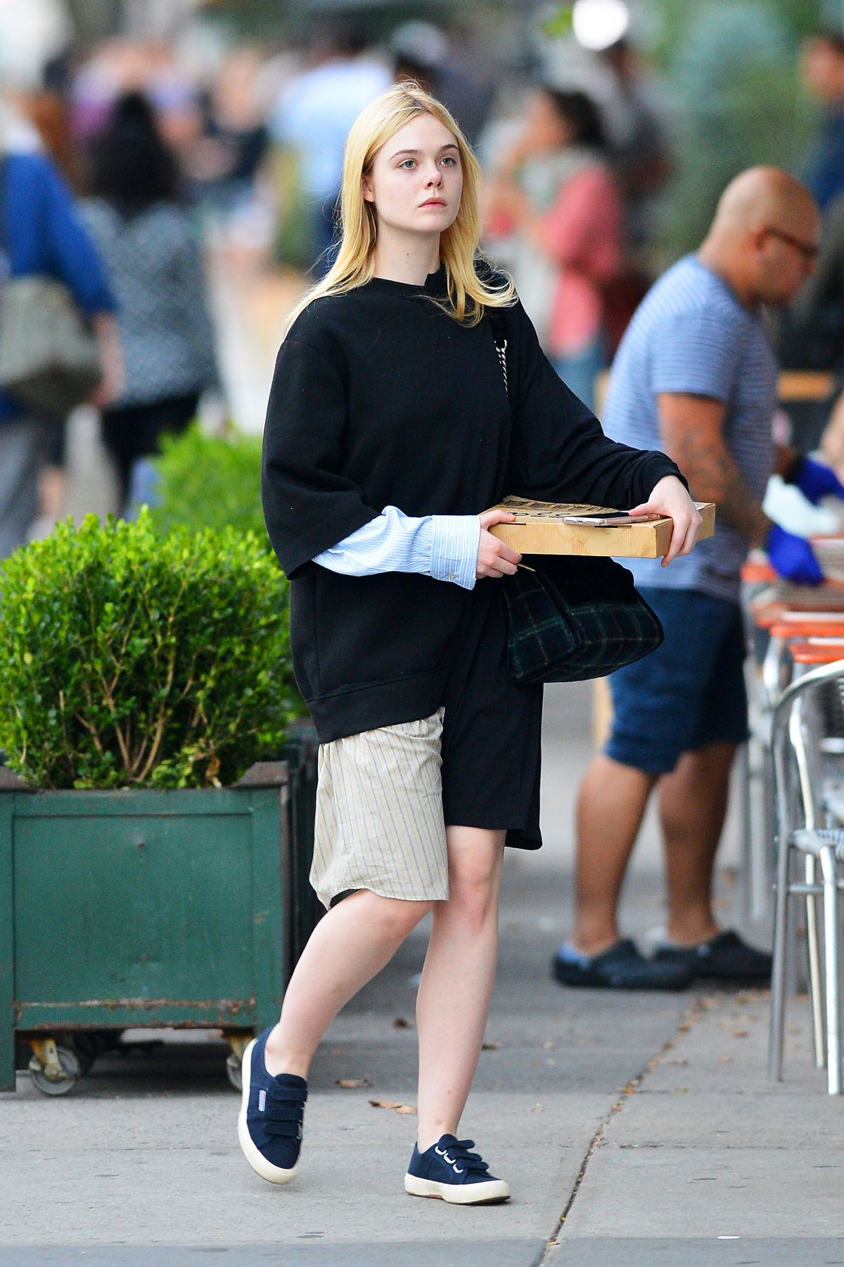 ELLE FANNING Picks Up a Pizza in New York 10/05/2017 – HawtCelebs