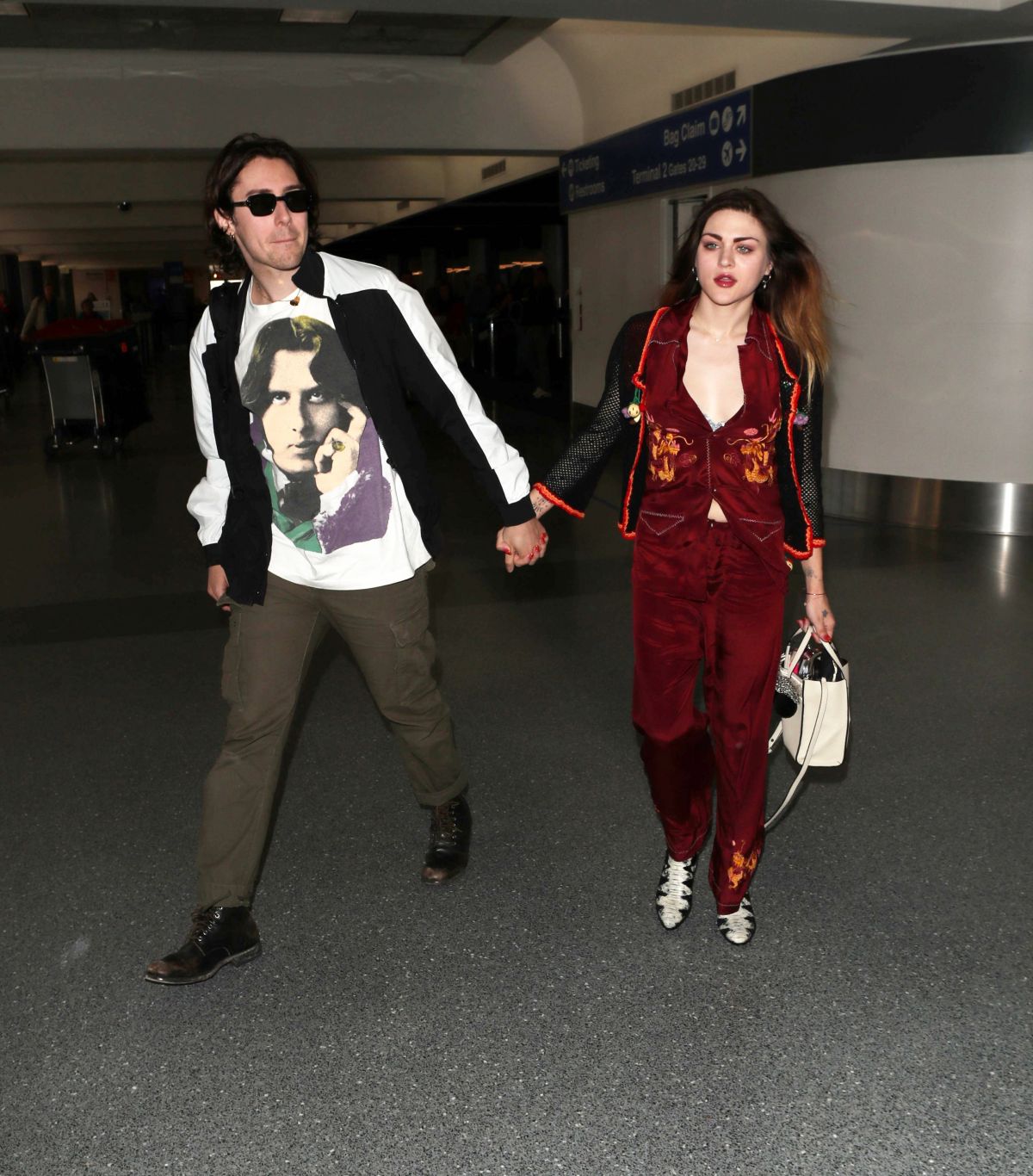 FRANCES BEAN COBAIN and Matthew Cook at LAX Airport in Los Angeles 02 ...