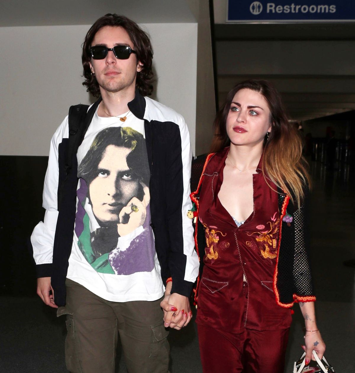 FRANCES BEAN COBAIN and Matthew Cook at LAX Airport in Los Angeles 02 ...