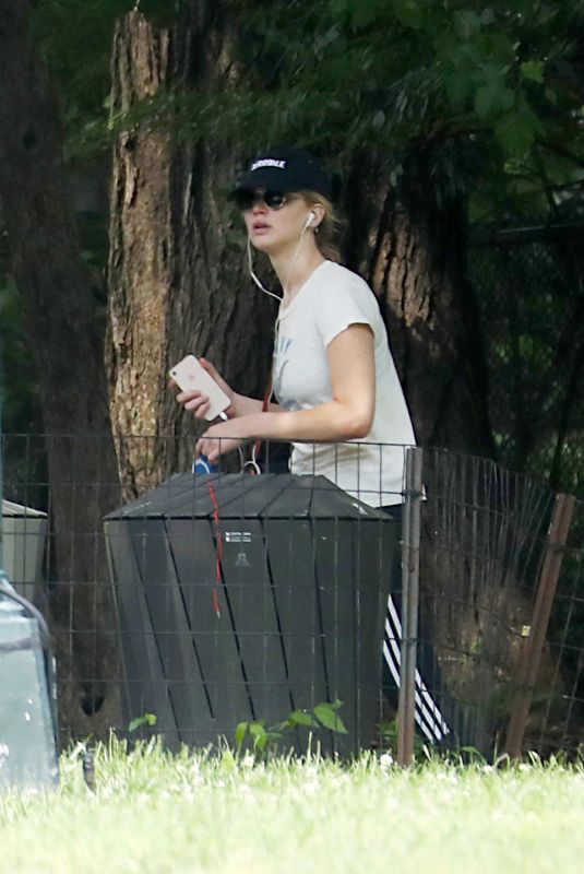 JENNIFER LAWRENCE Out wih Her Dog in Central Park in New York 06/10 ...