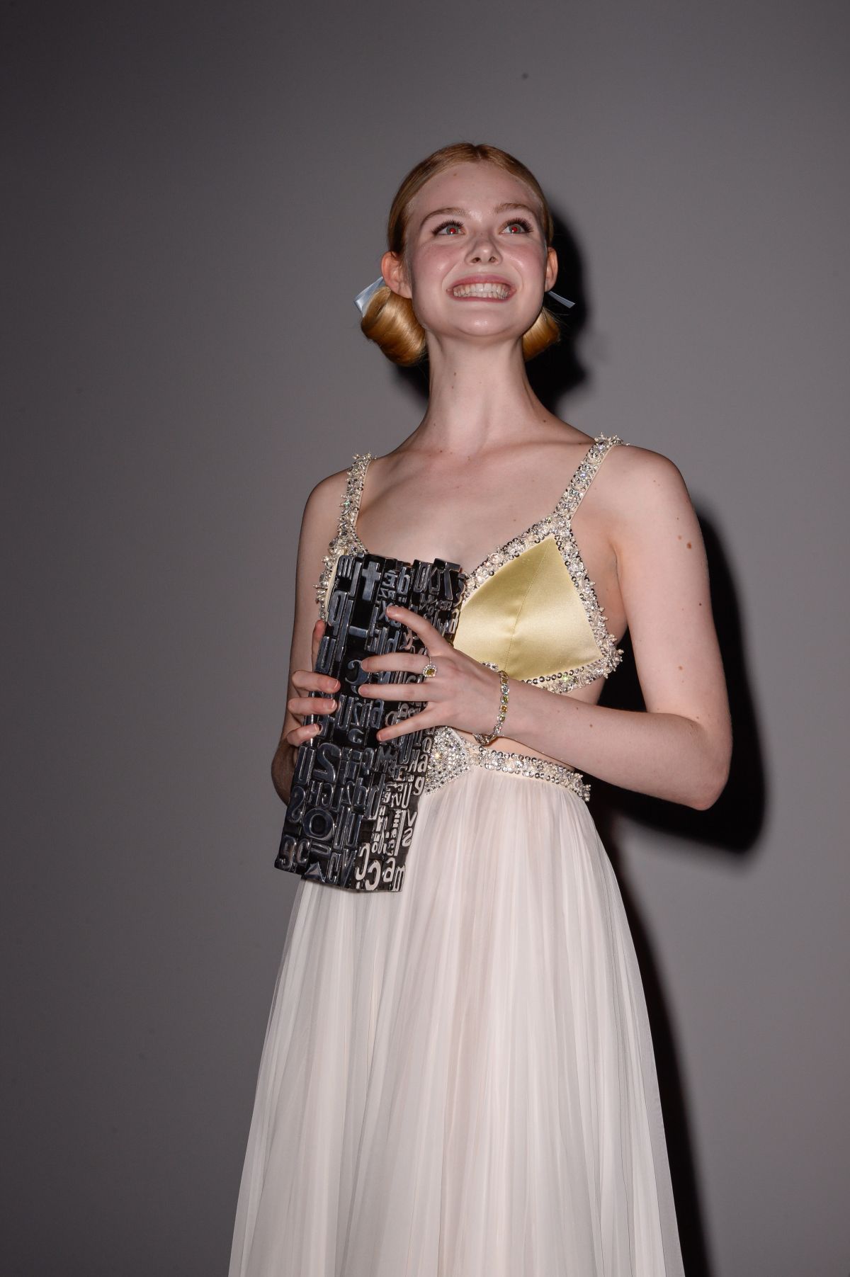 ELLE FANNING Receiving Deauville Talent Award at Deauville American ...