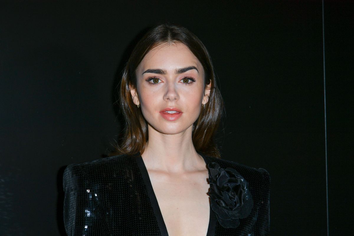 LILY COLLINS at Saint Laurent Fashion Show at PFW in Paris 02/25/2020 ...