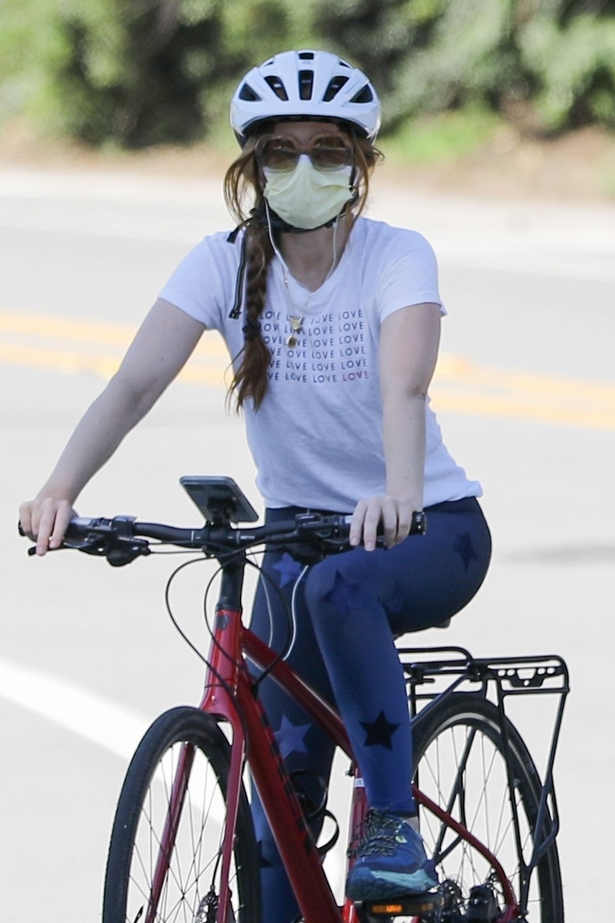 ISLA FISHER and Sacha Baron Cohen Out Riding Bikes in Los Angeles 04/24 ...