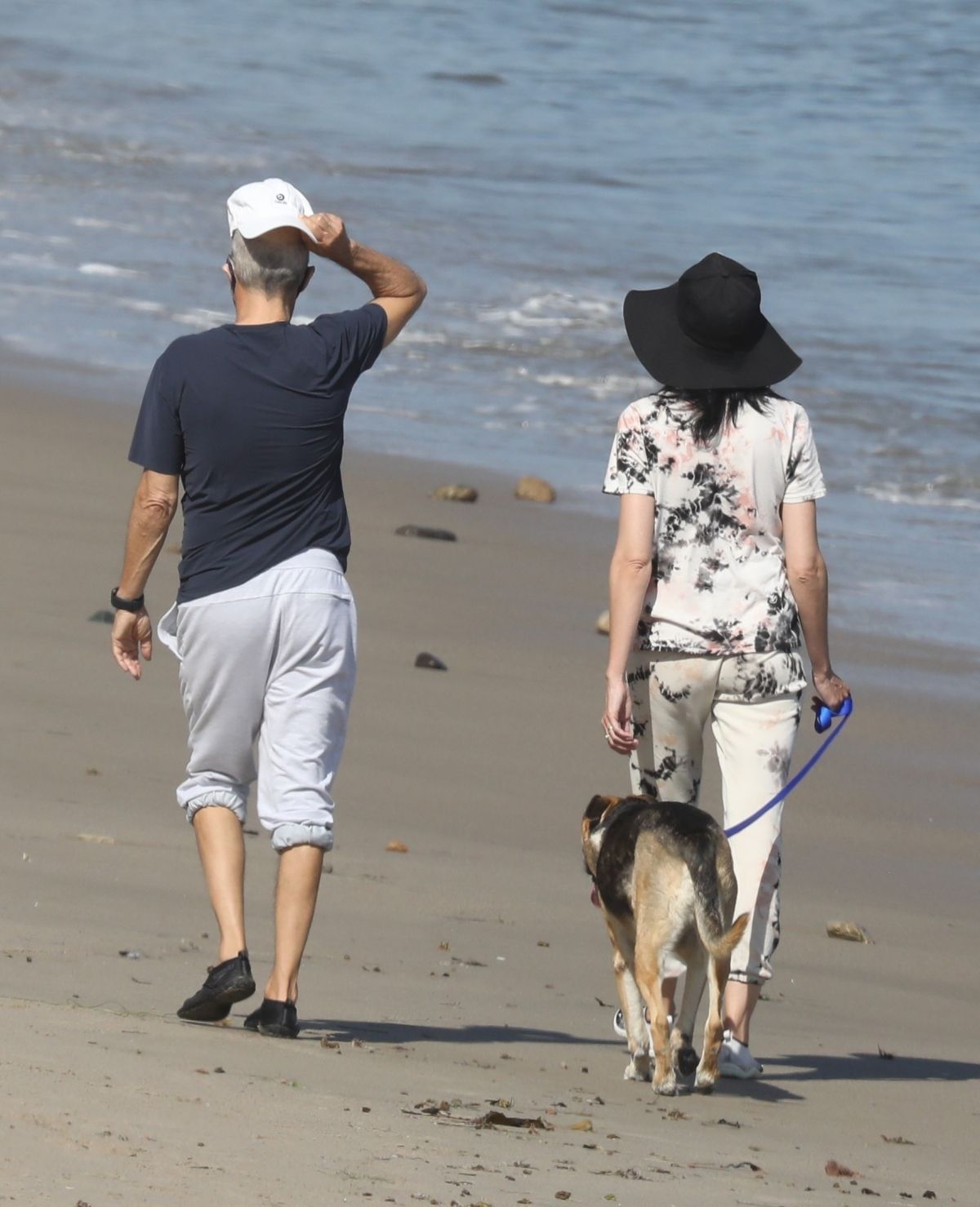 LIBERT RISS and Jimmy Iovine Out with Their Dog on the Beach in Malibu ...
