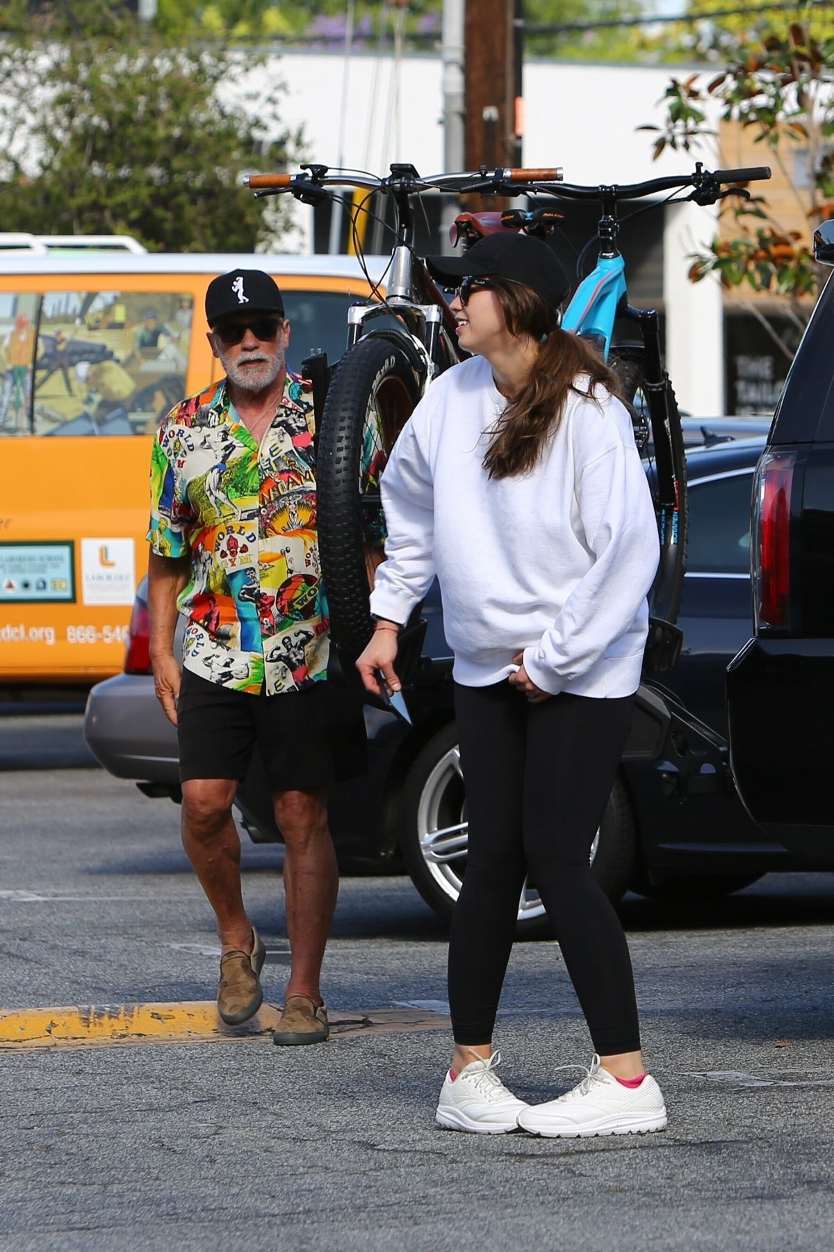 CHRISTINA and Arnold SCHWARZENEGGER Out Riding Bikes in Brentwood 06/15 ...