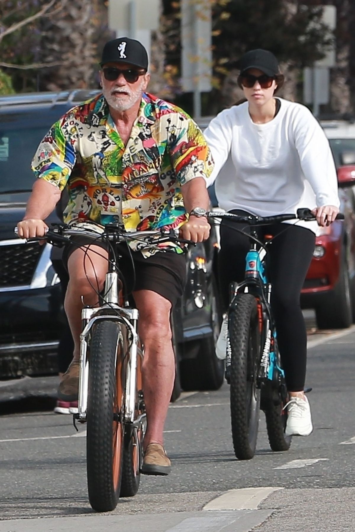 CHRISTINA and Arnold SCHWARZENEGGER Out Riding Bikes in Brentwood 06/15 ...