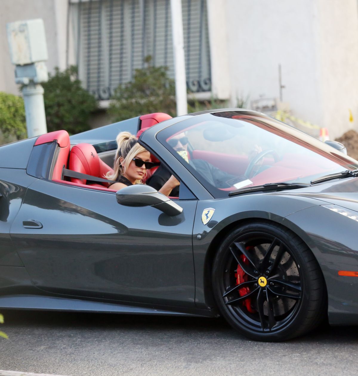 BEBE REXHA Gets a New Ferrari Delivered to Her Home in Los Angeles 09 ...