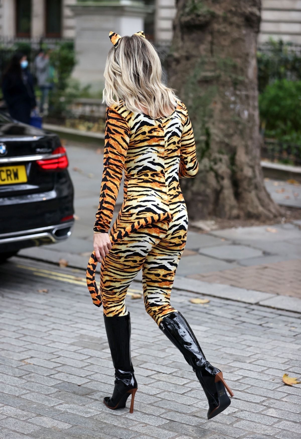 ASHLEY ROBERTS in a Tiger Print Catsuit Leaves Heart Radio in London 10 ...