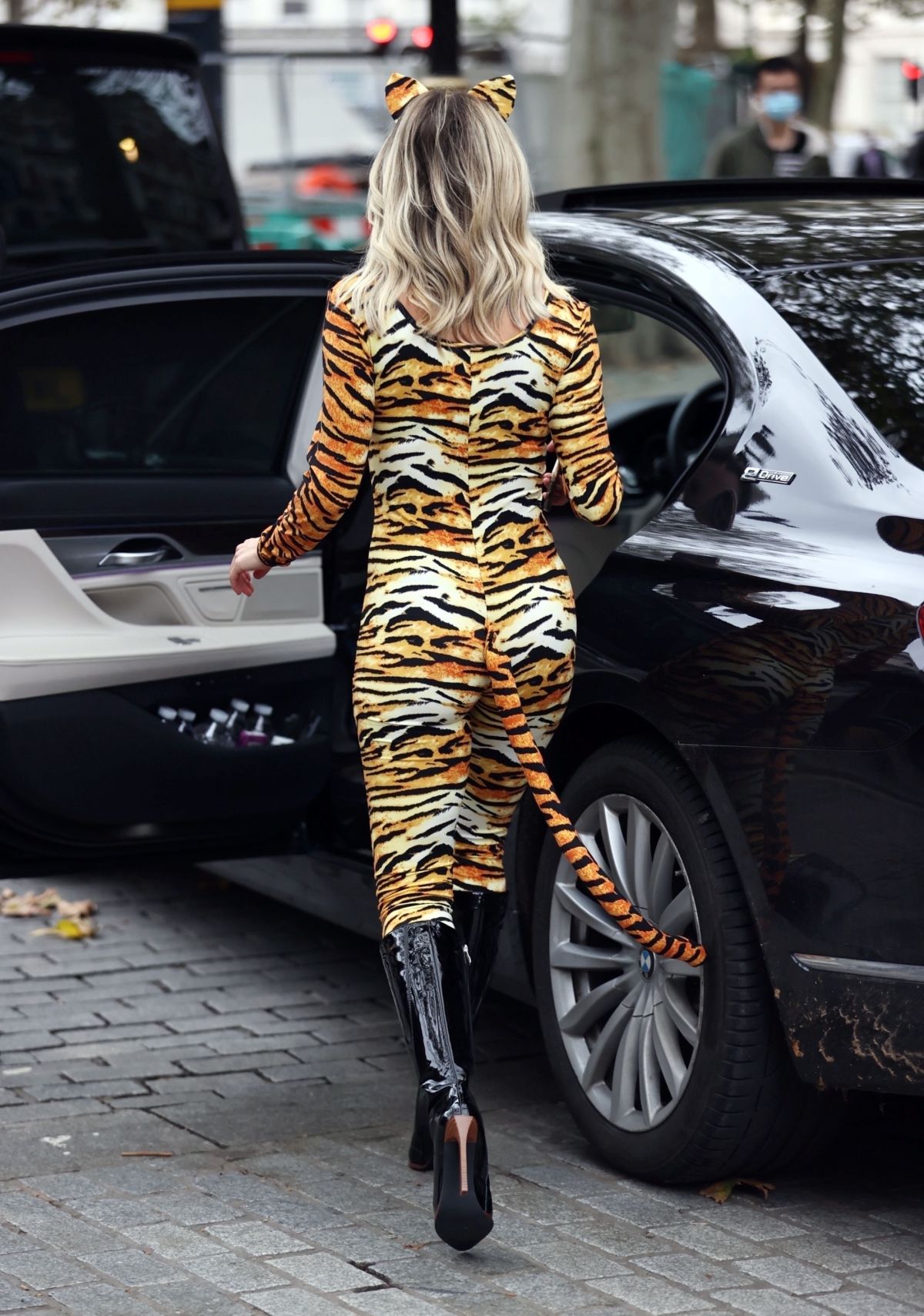 ASHLEY ROBERTS in a Tiger Print Catsuit Leaves Heart Radio in London 10 ...