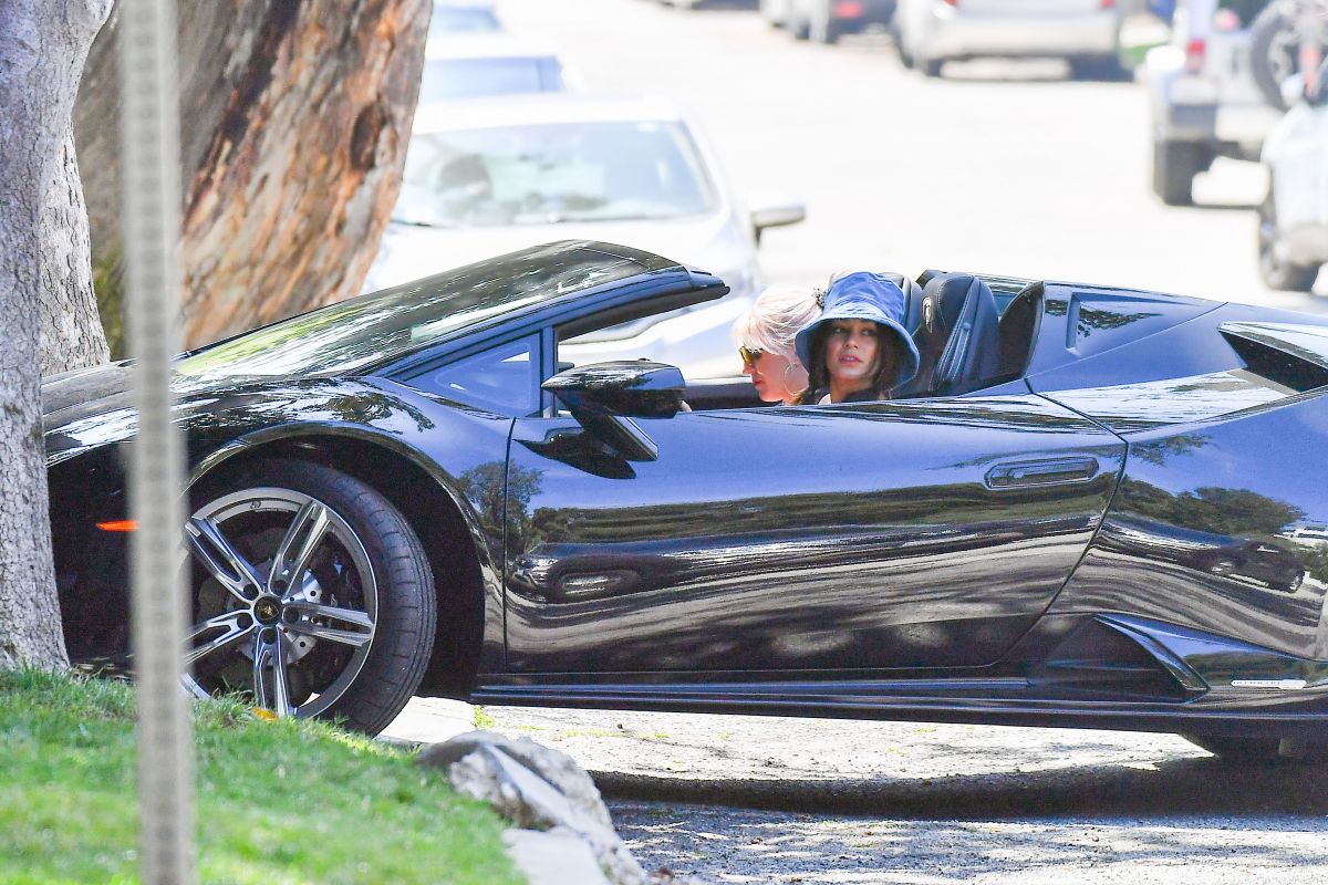 VANESSA HUDGENS Out Driving in Her Lamborghini in West Hollywood 04/03 ...