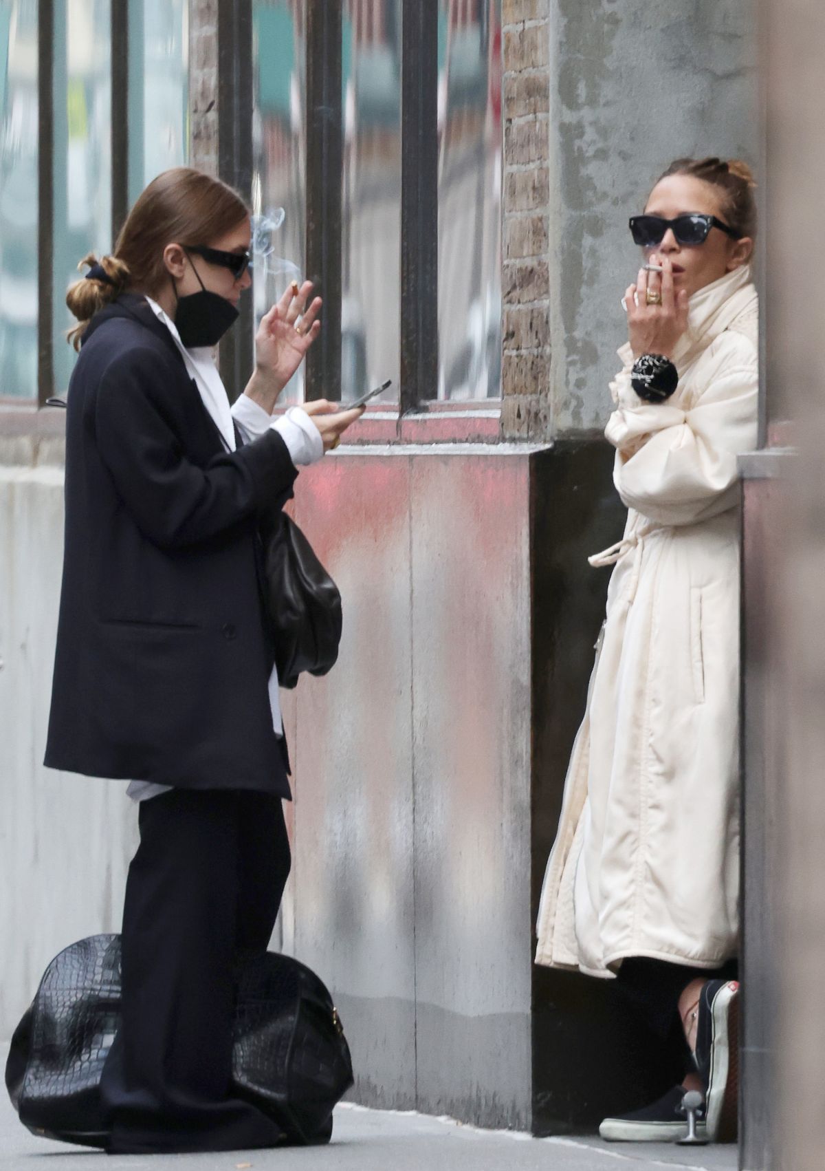 ASHLEY and MARY KATE OLSEN at Smoke Break Outside of Their Offices in ...