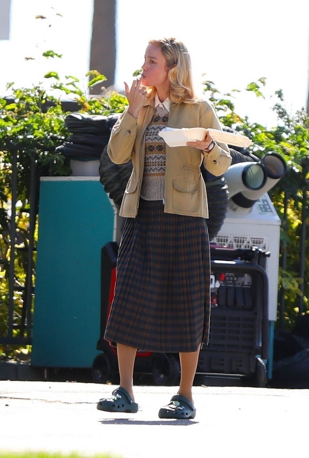 BRIE LARSON on the Set of Lessons in Chemistry in Los Angeles 08/10 ...