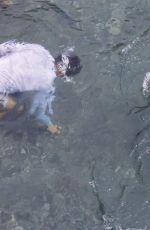 KATY PERRY in Swimsuit at a Beach in Positano 08/26/2022 – HawtCelebs