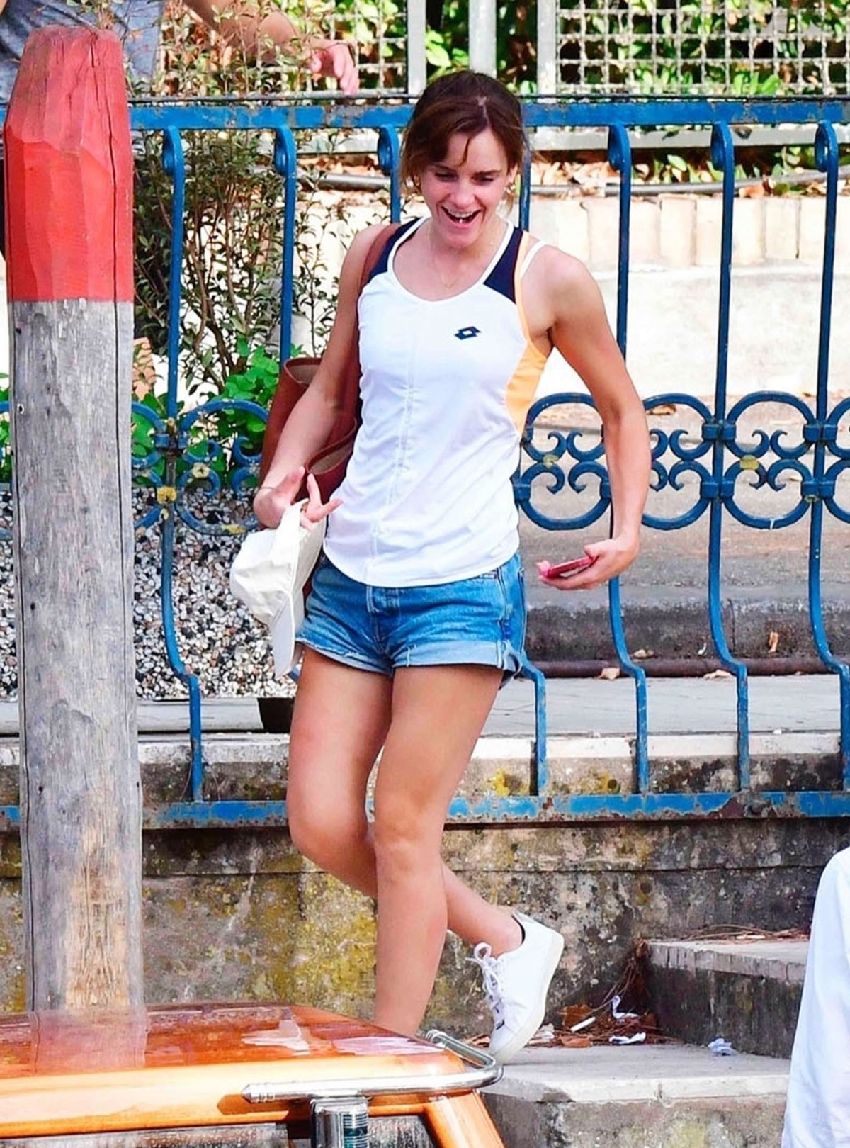 EMMA WATSON in Senim Shorts Catching a Water Taxi in Venice 08/30/2022 ...
