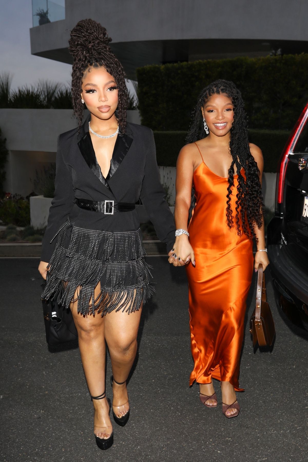CHLOE and HALLE BAILEY Arrives at Jennifer Lopez X Revolve Collab Party ...