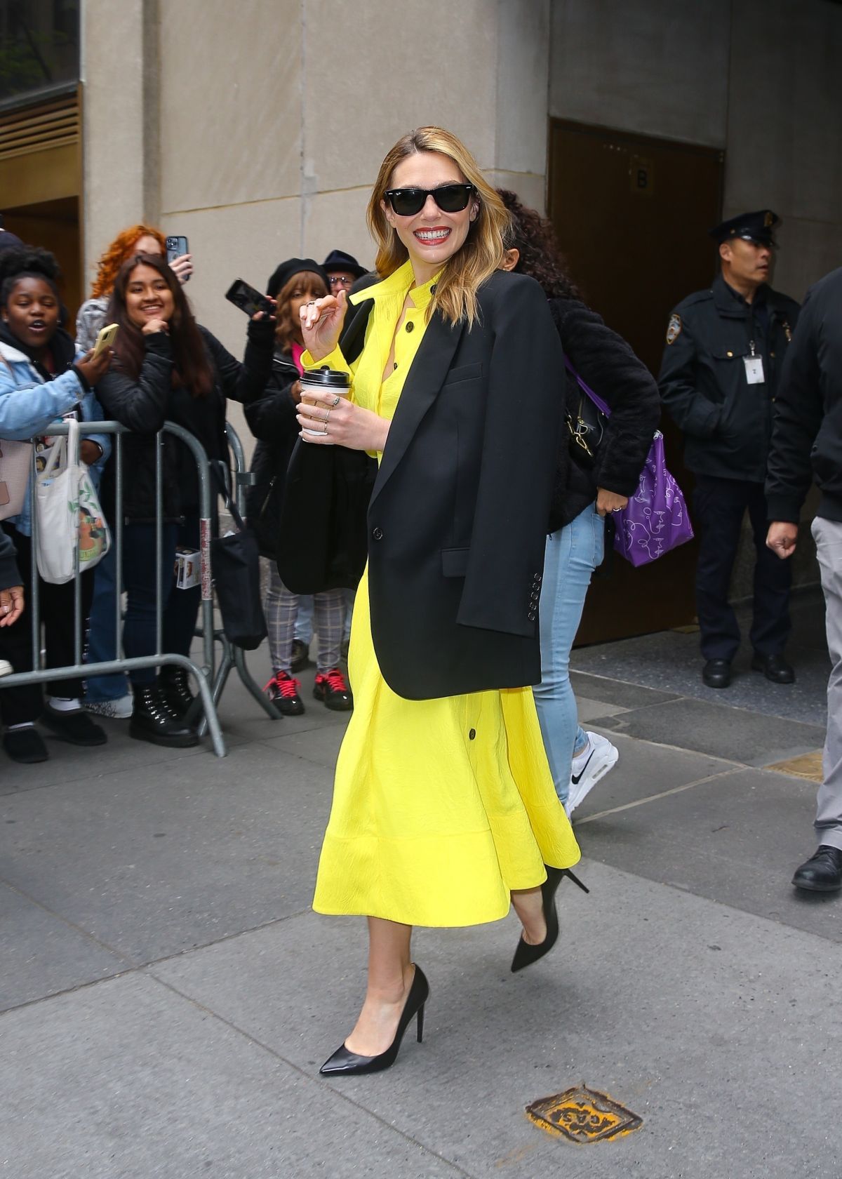 ELIZABETH OLSEN Greeting Fans Out in New York 04/19/2023 – HawtCelebs