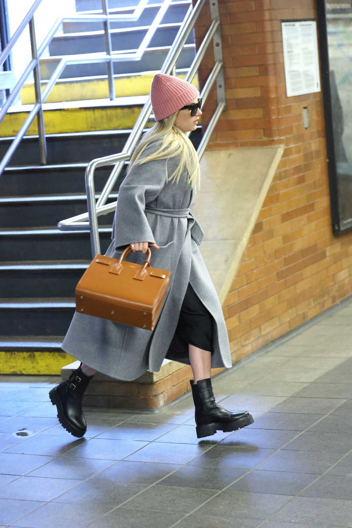 EMMA ROBERTS Filming at a Local Subway Station in Manhattan 04/25/2023 ...