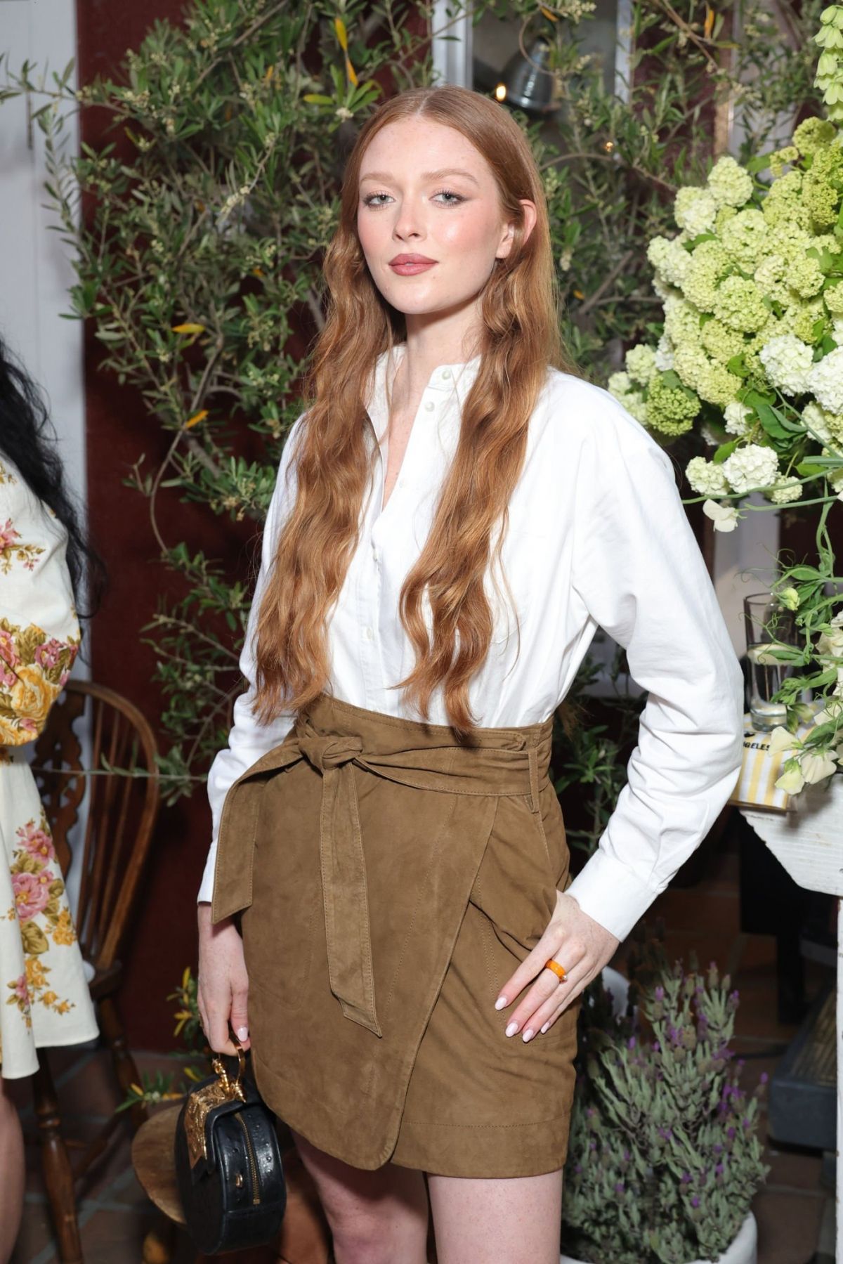 LARSEN THOMPSON at Laura Brown and Sezane Fete Opening at Brentwood ...