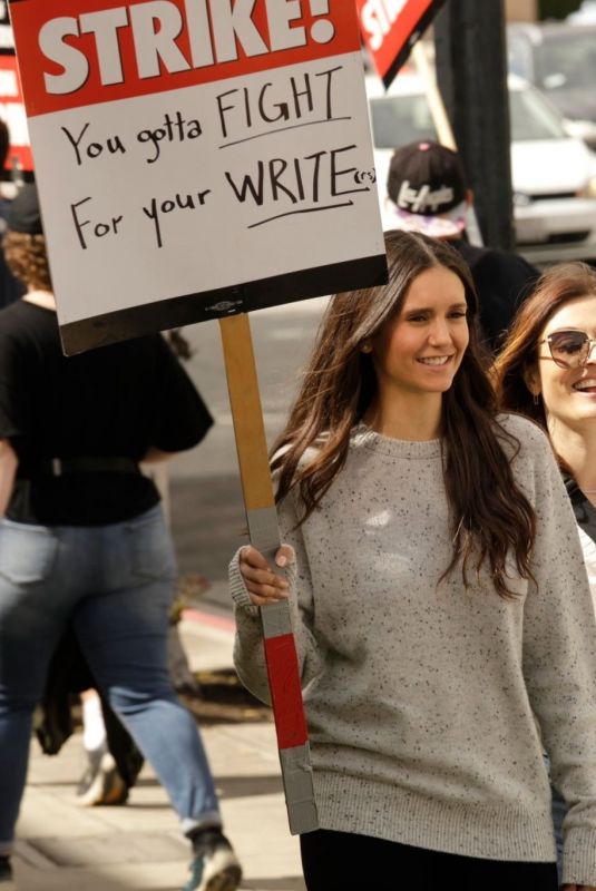 NINA DOBREV Walks Picket Line at WGA Strike in Burbank 05/04/2023 ...
