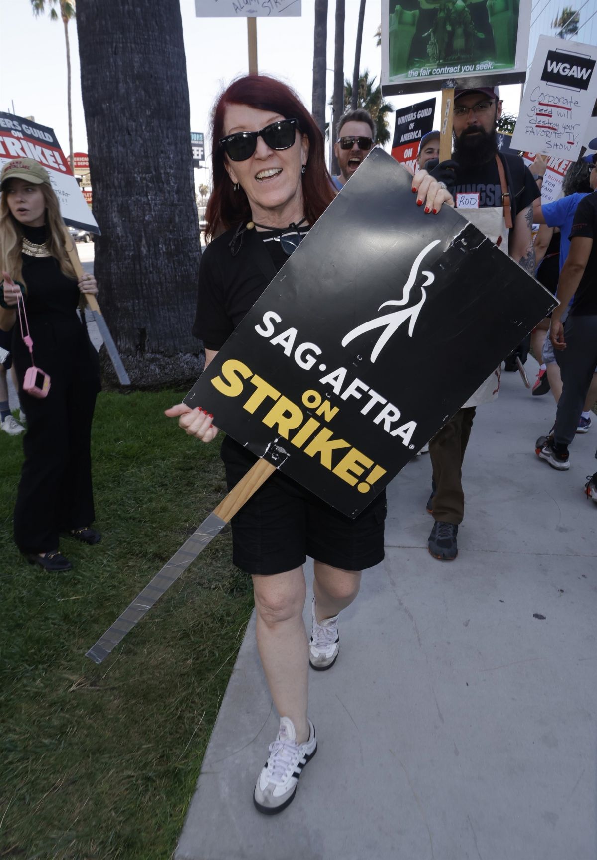 KATE FLANNERY at SAG-Aftra and WGA Picket Line at Netflix Offices in ...
