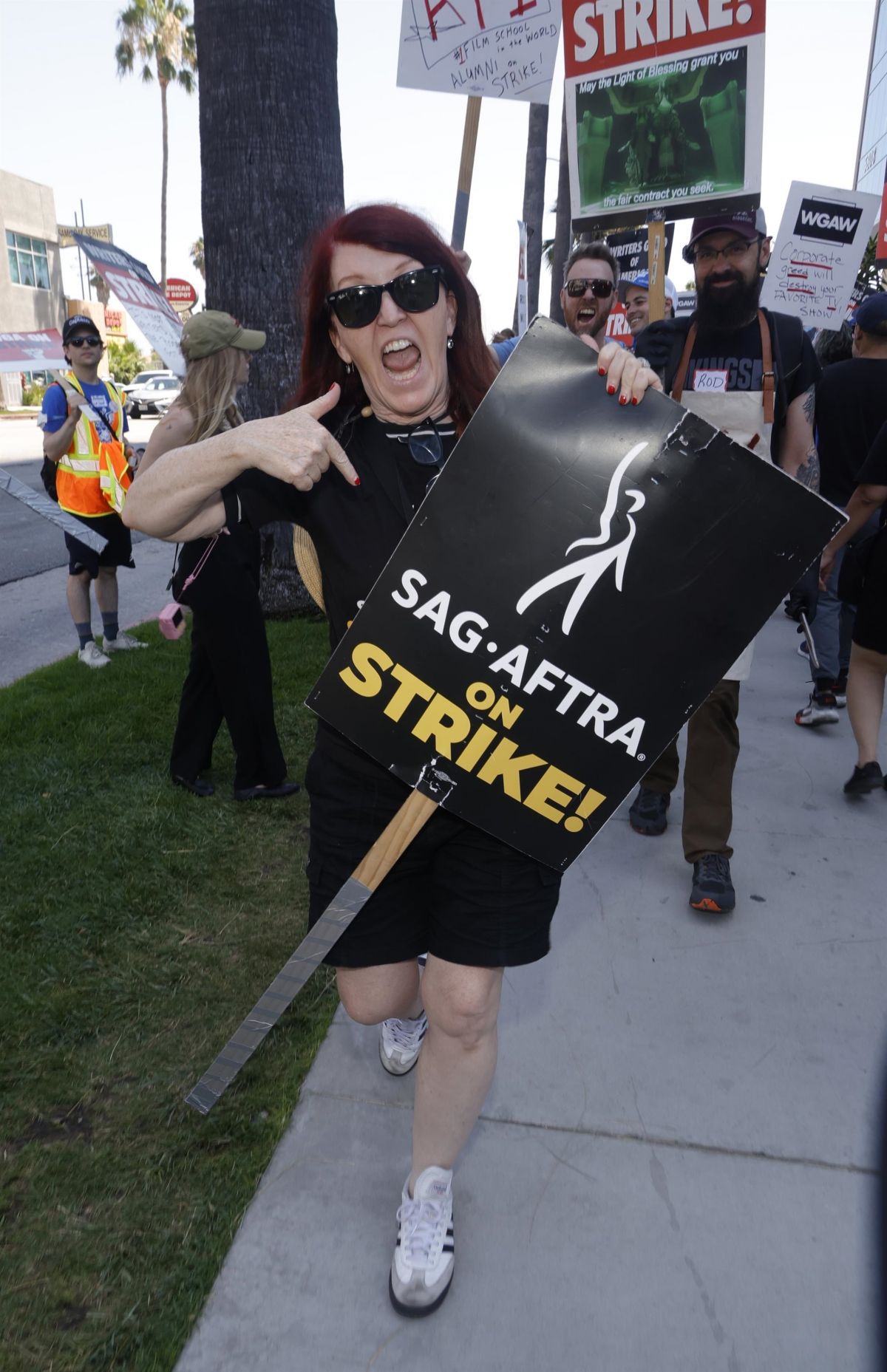KATE FLANNERY at SAG-Aftra and WGA Picket Line at Netflix Offices in ...