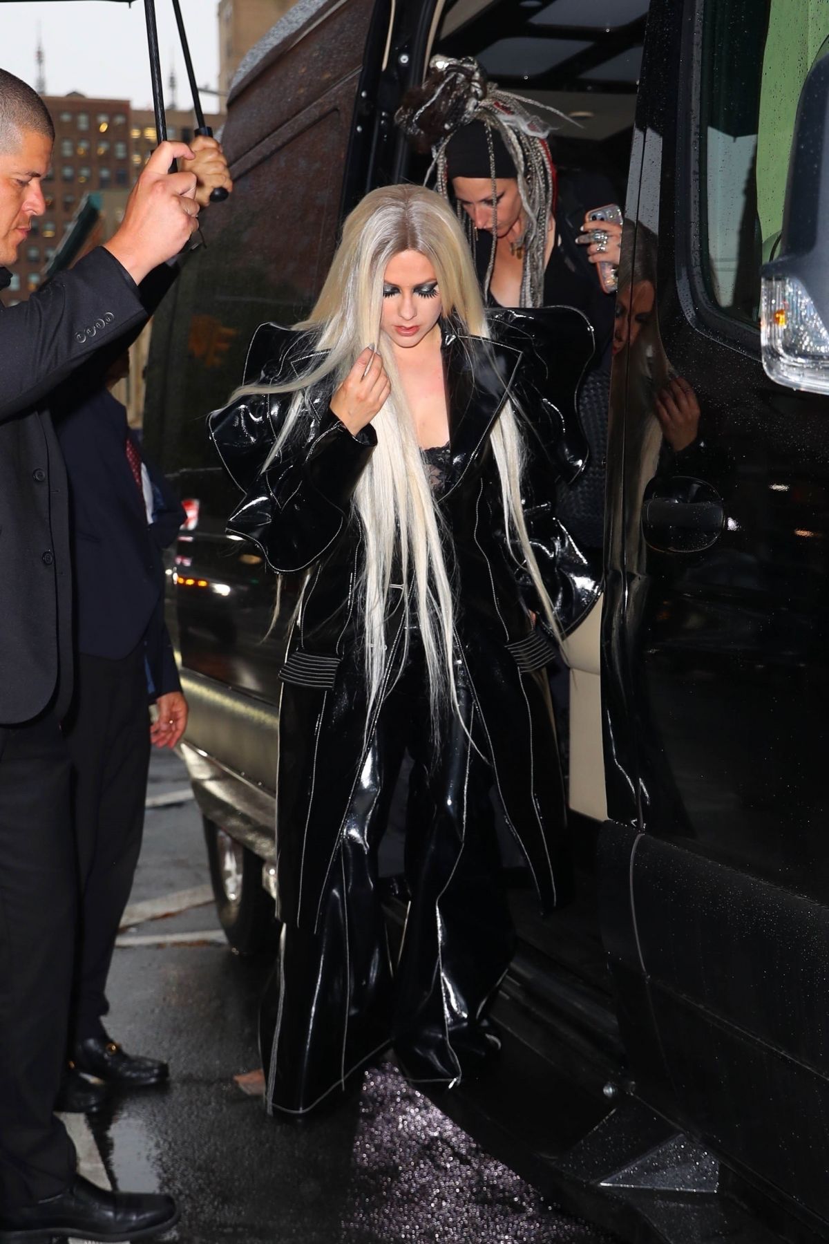 AVRIL LAVIGNE Arrives at Christian Siriano SS24 Runway Show at New York ...