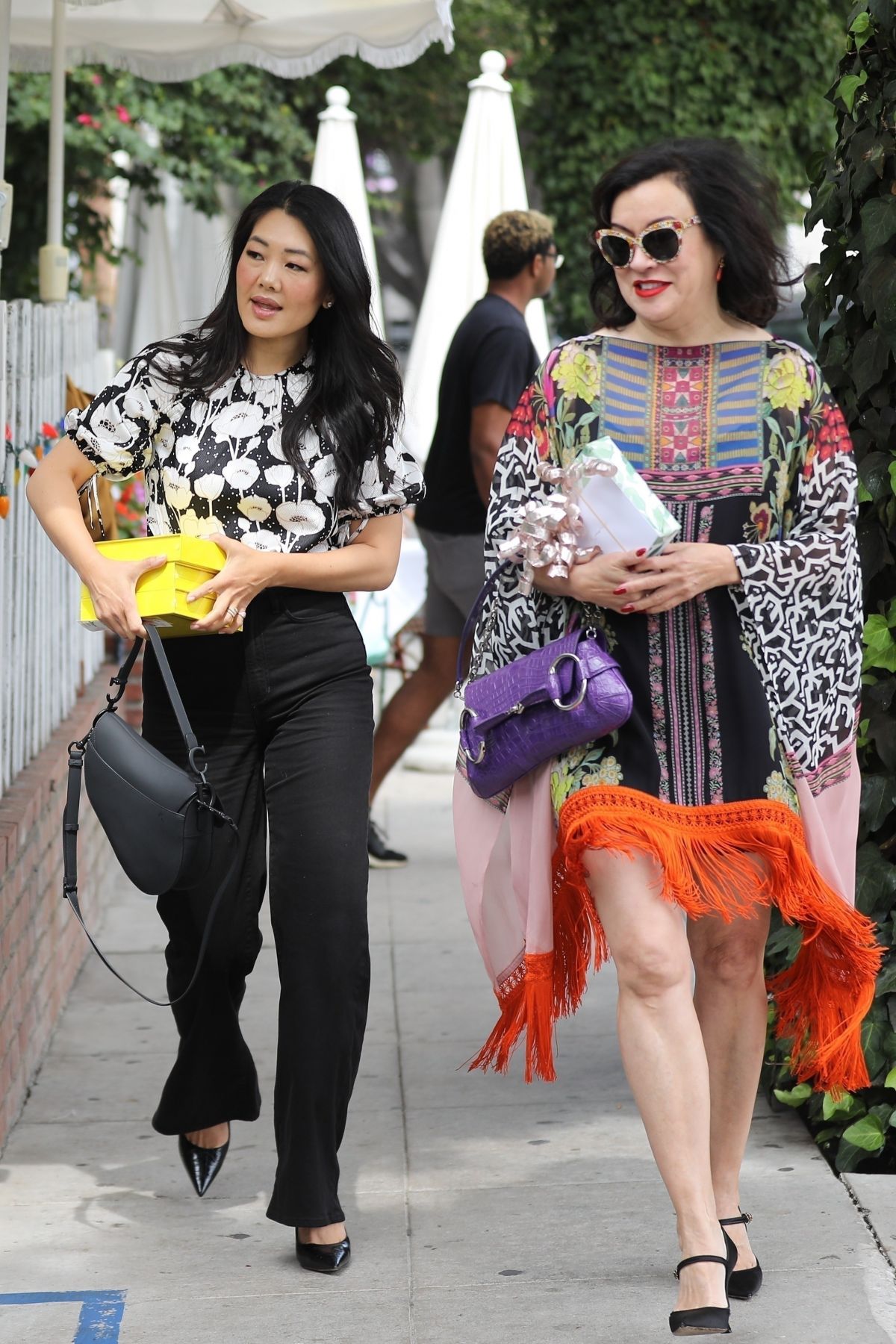 CRYSTAL MINKOFF and JENNIFER TILLY at The Ivy Restaurant in Los Angeles ...