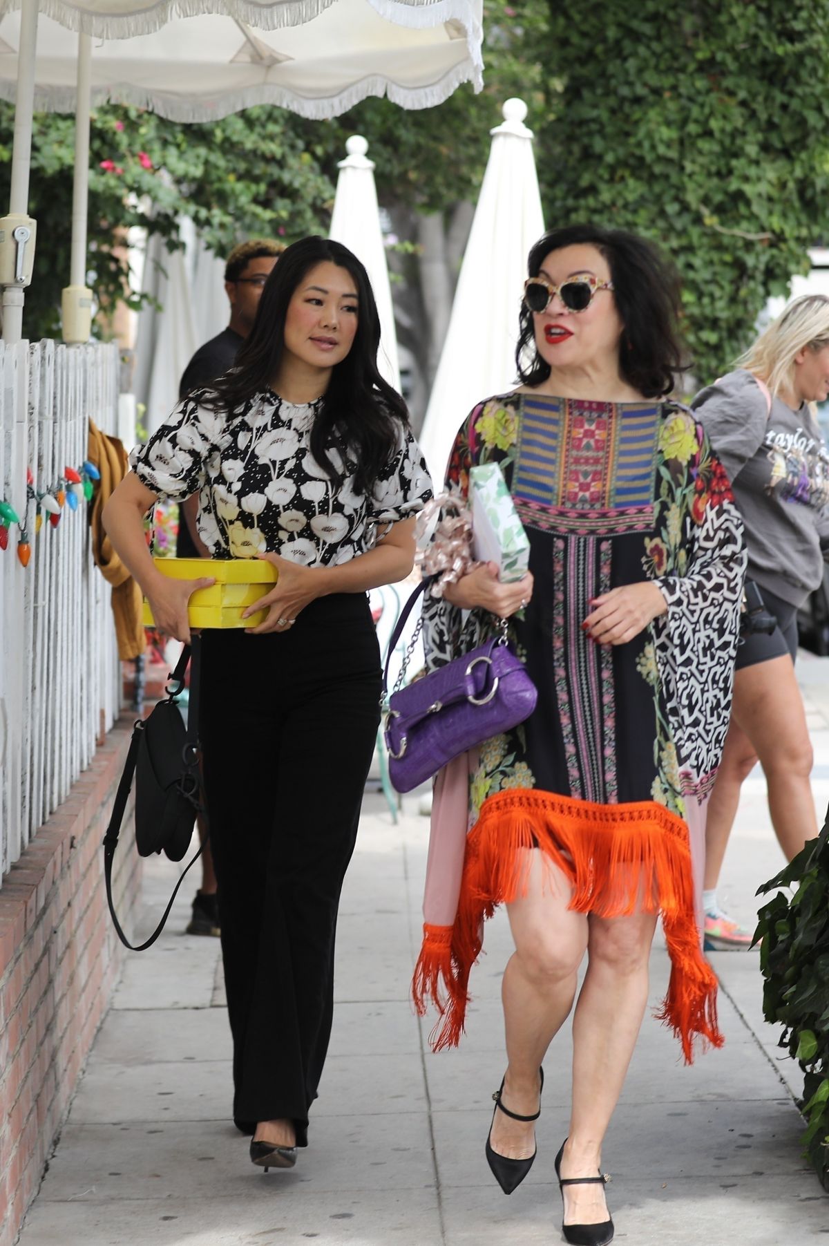 CRYSTAL MINKOFF and JENNIFER TILLY at The Ivy Restaurant in Los Angeles ...