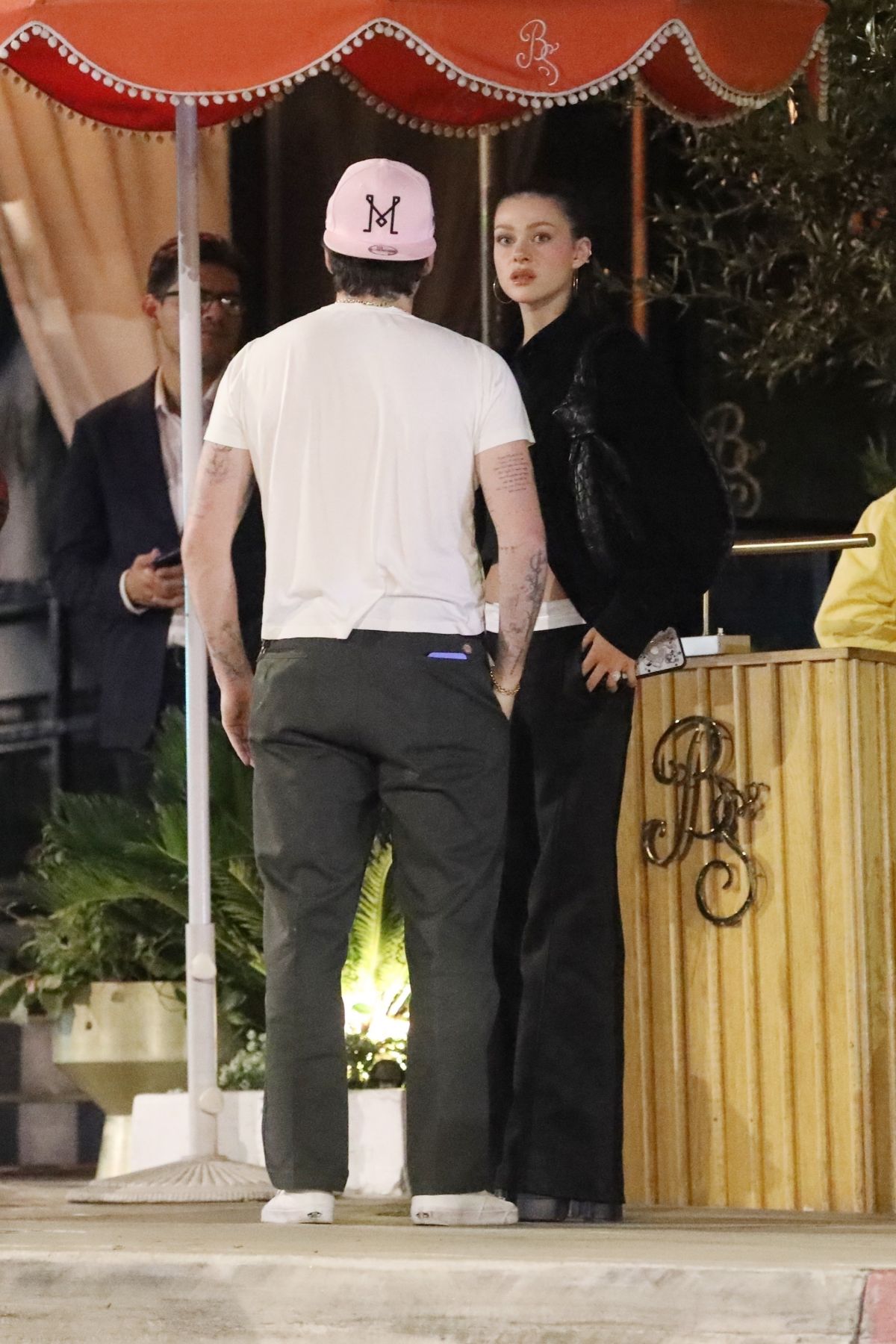 NICOLA PELTZ and Brooklyn Beckham Leavies The Bird Streets Club in West ...