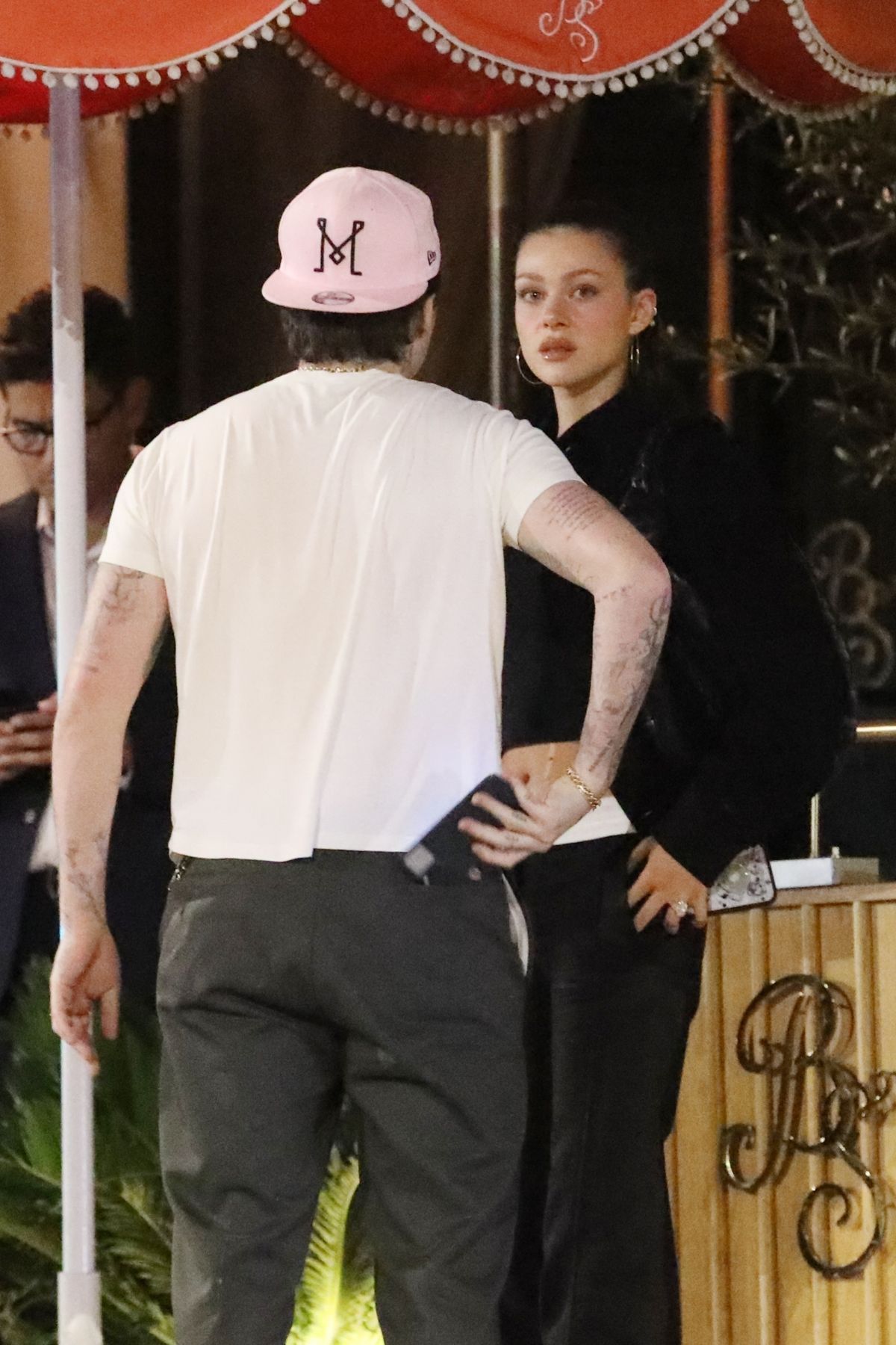 NICOLA PELTZ and Brooklyn Beckham Leavies The Bird Streets Club in West ...