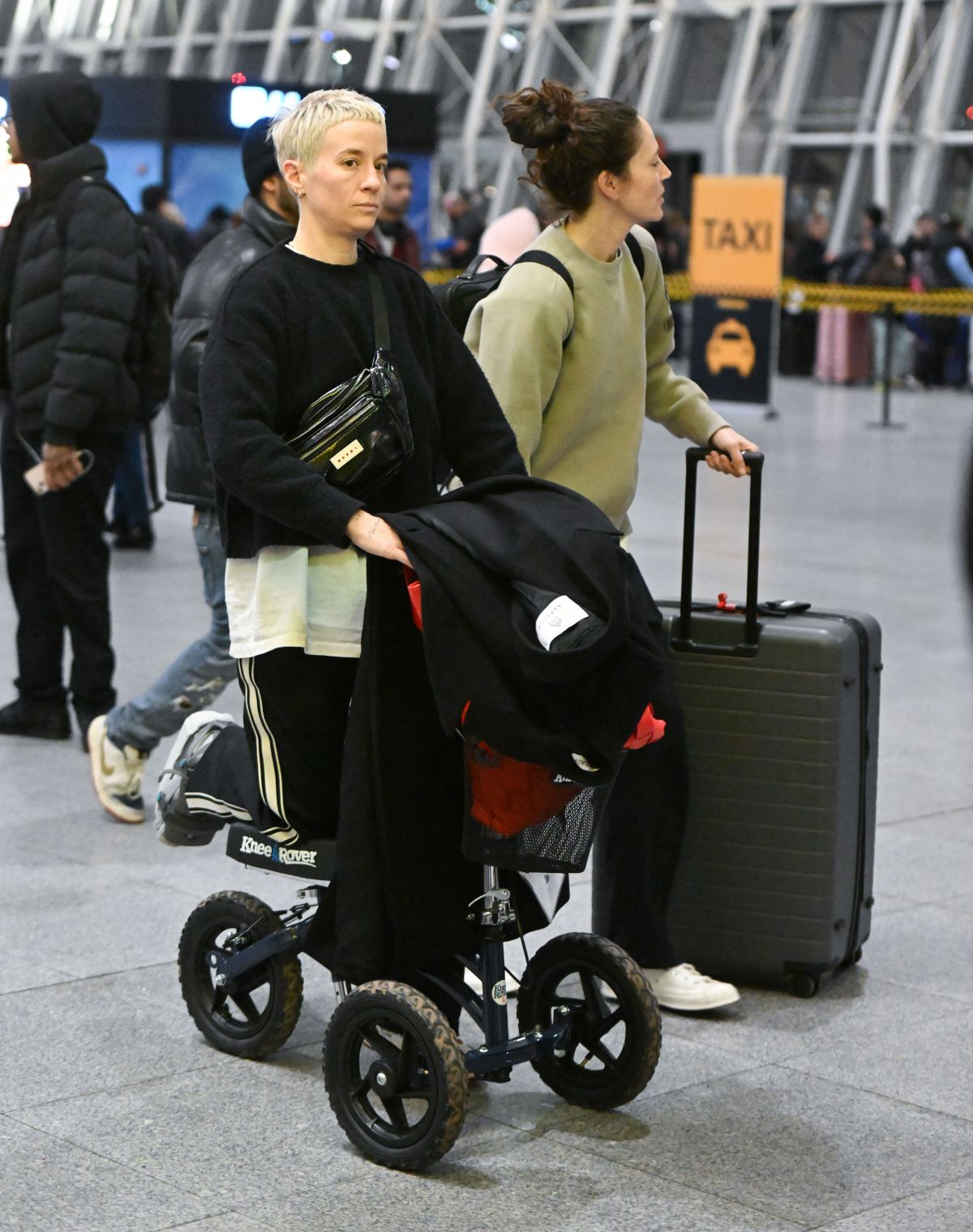 MEGAN RAPINOE and SUE BIRD Arrives at JFK Airport in New York 12/13 ...