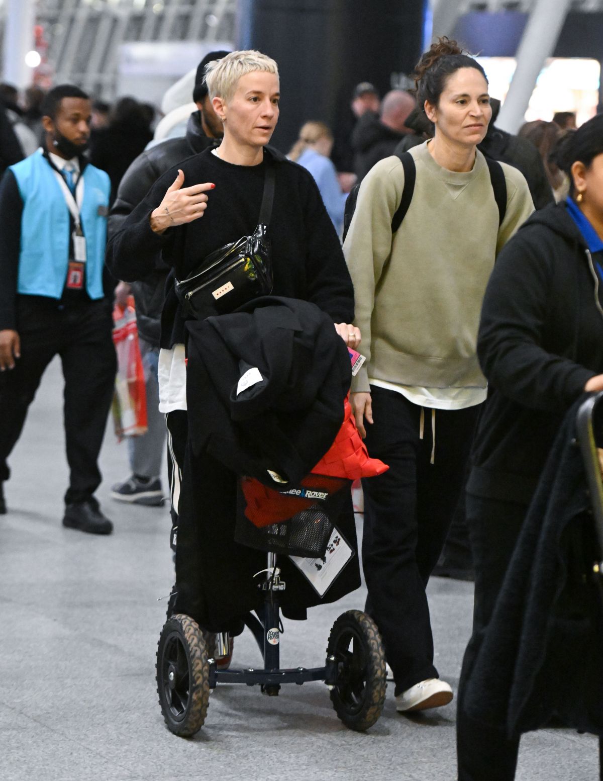 MEGAN RAPINOE and SUE BIRD Arrives at JFK Airport in New York 12/13 ...