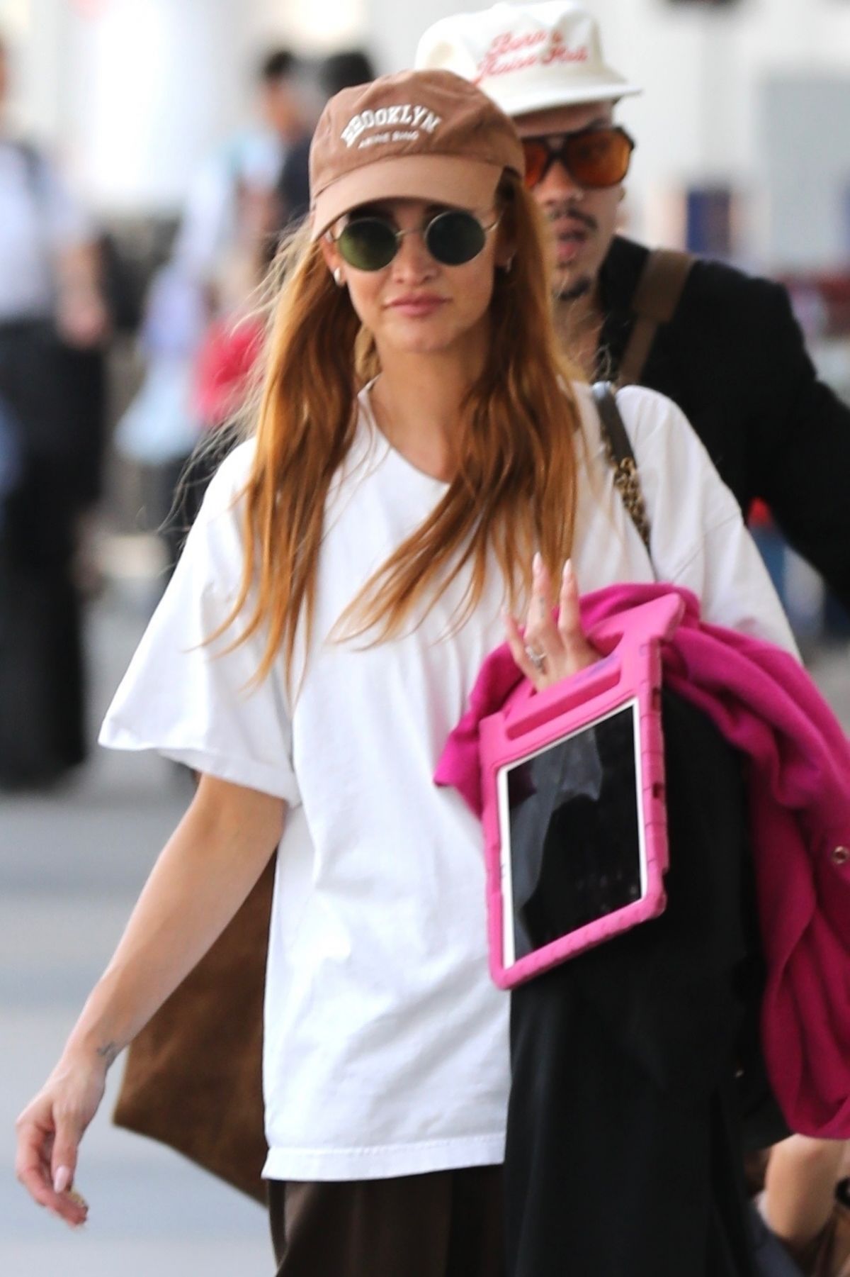 ASHLEE SIMPSON and Evan Ross at LAX Airport in Los Angeles 07/26/2024 ...