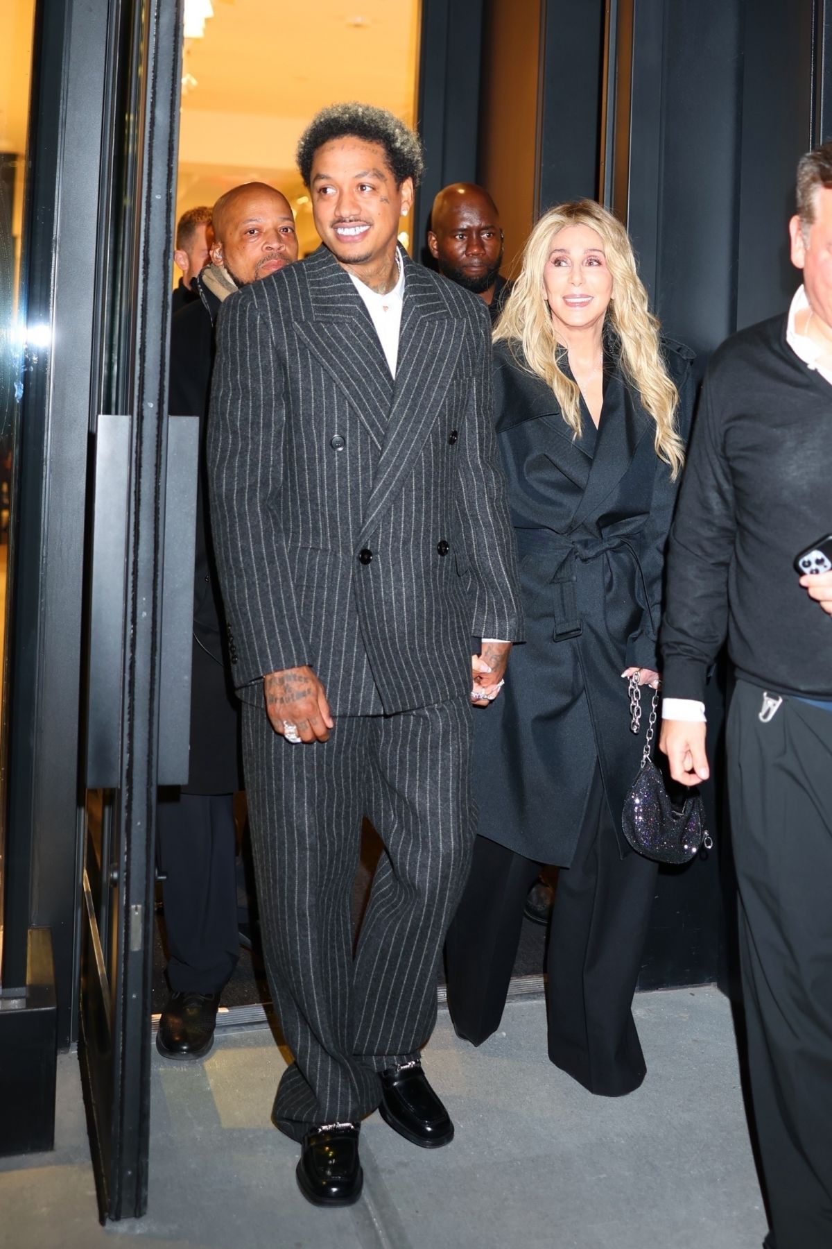 CHER and Alexander A.E. Edwards Leaves Burberry Store Opening Event in ...
